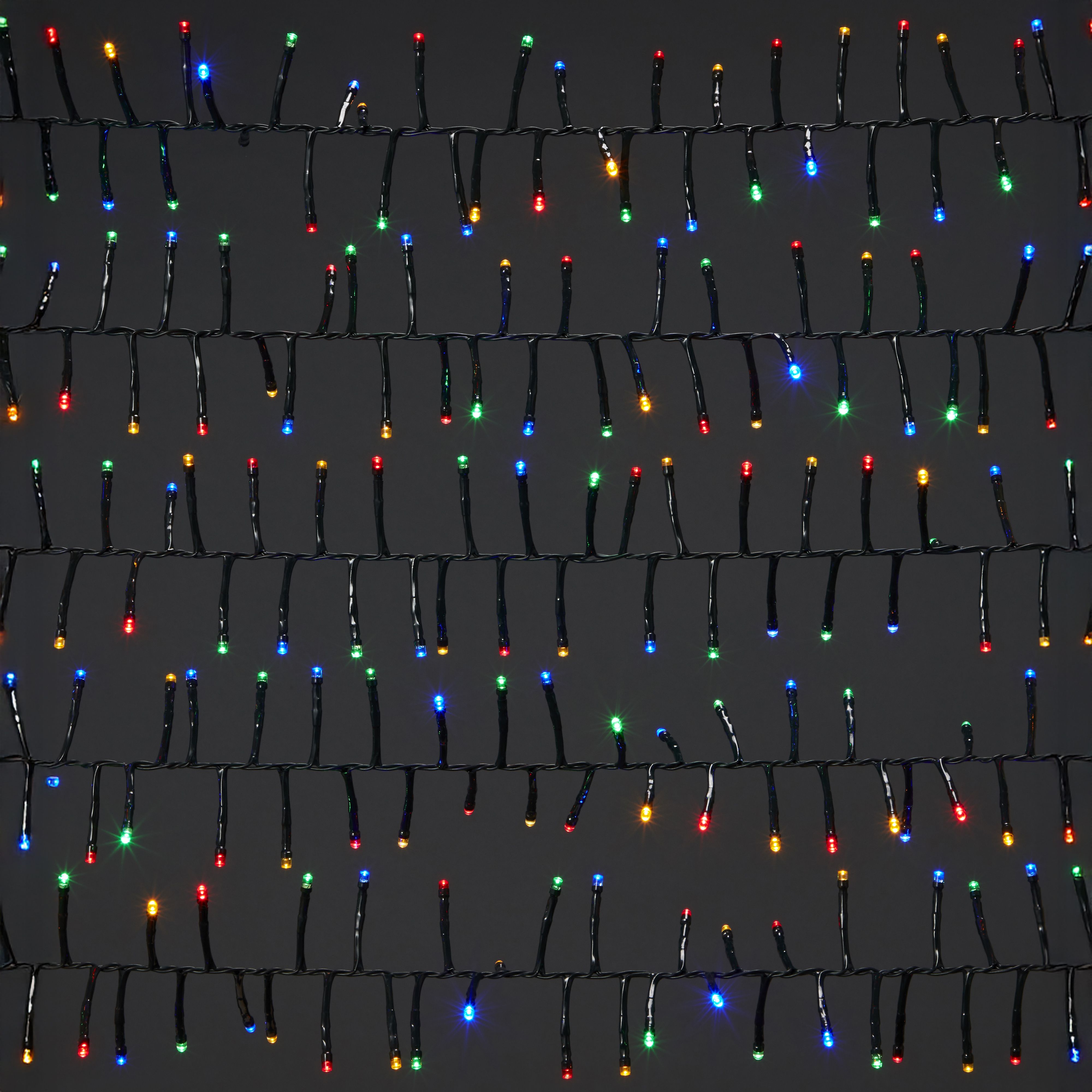 1000 Multicolour Cluster LED String lights Green cable | DIY at B&Q