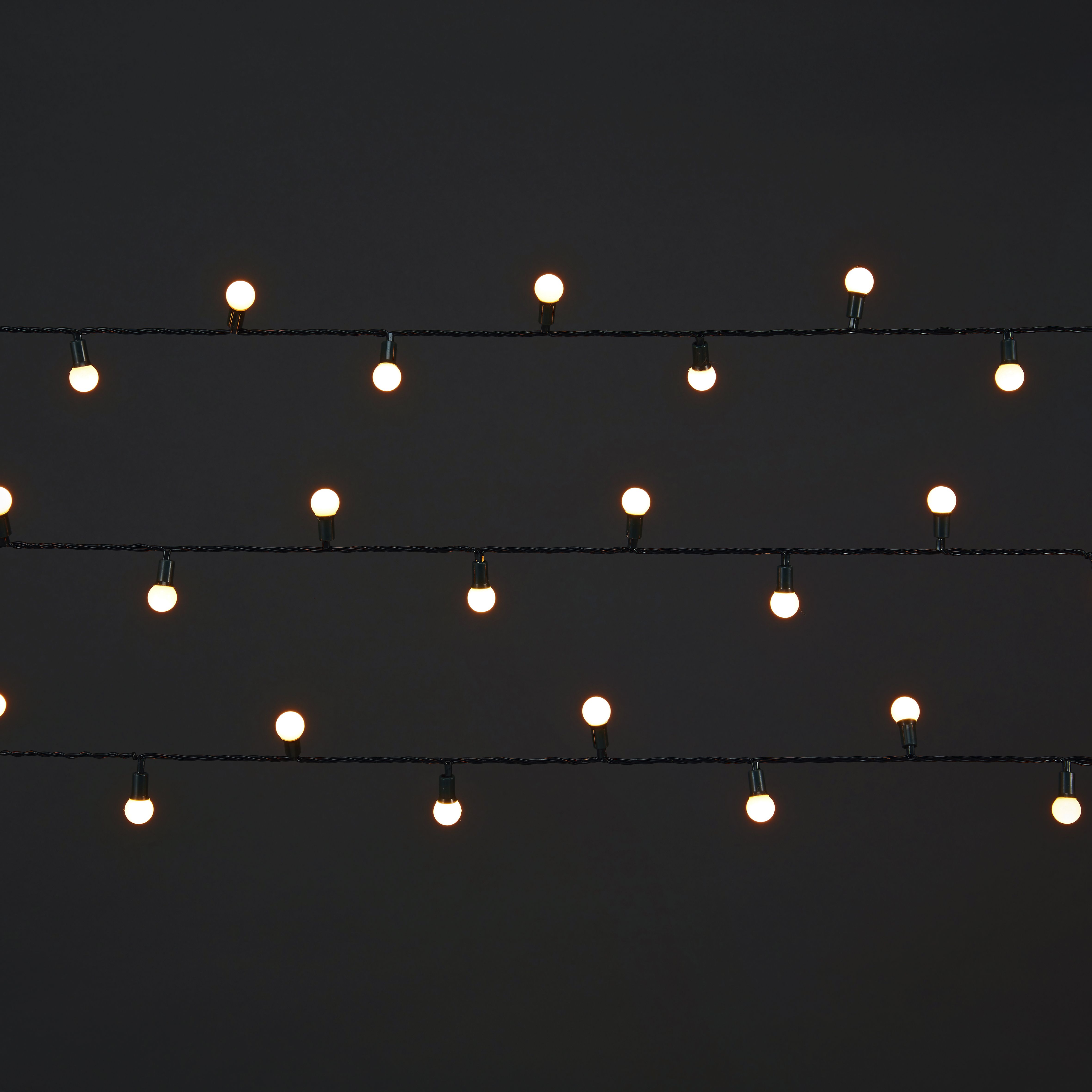 240 Warm white LED Berry String lights Green cable | DIY at B&Q