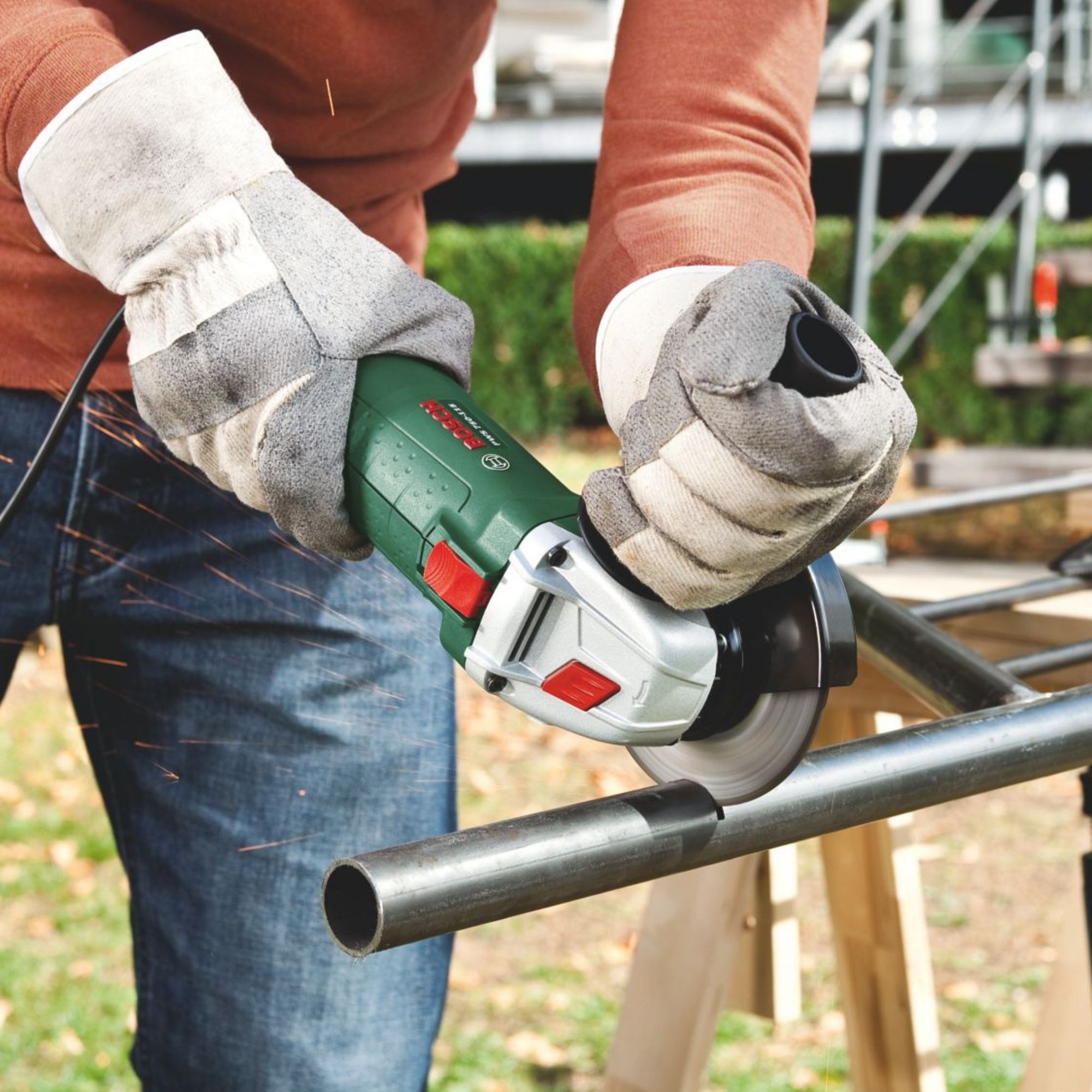 Bosch 750W 240V 115mm Corded Angle grinder PWS 750-115 | DIY at B&Q