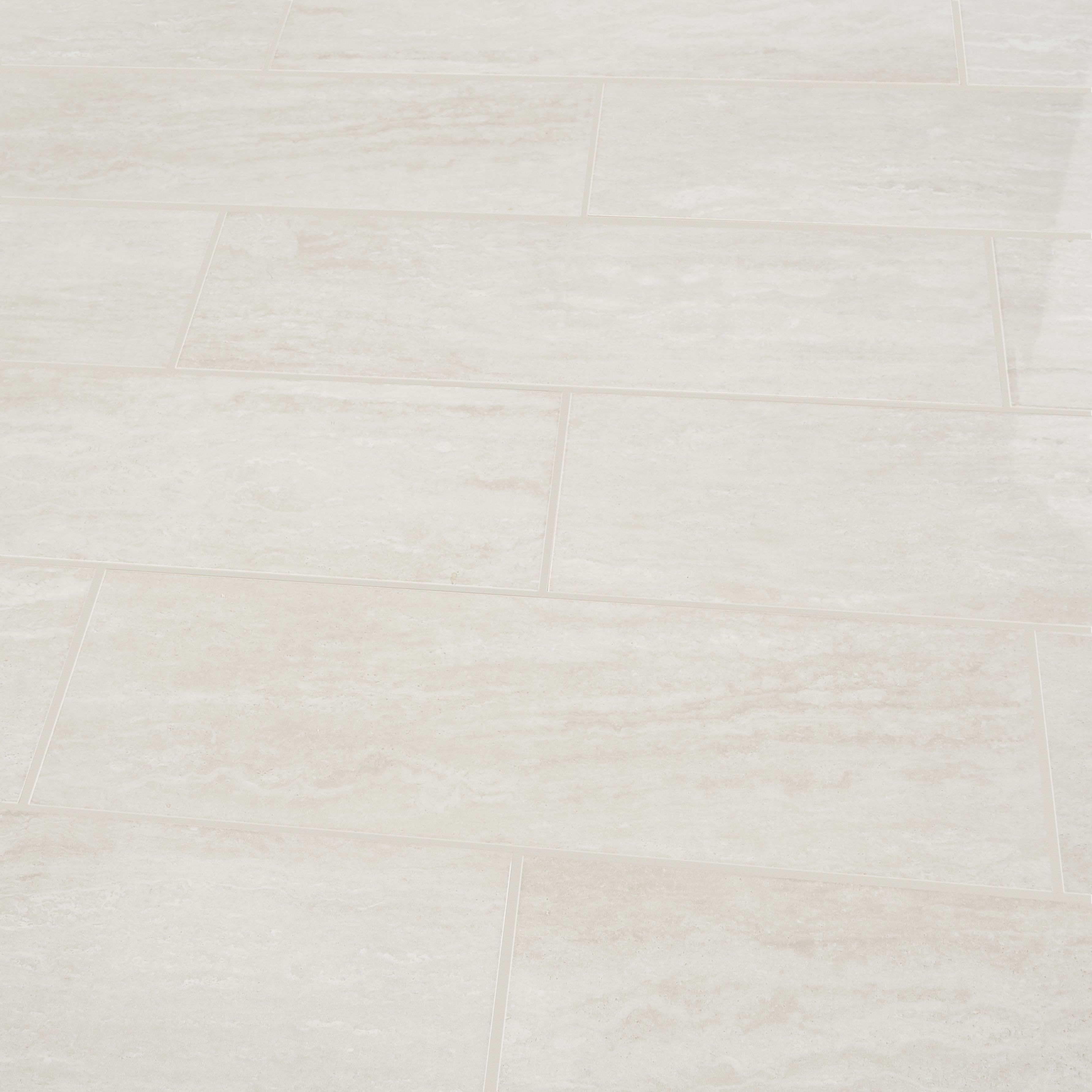 Soft travertin Ivory Gloss Stone effect Ceramic Indoor Tile, Pack of 9 ...