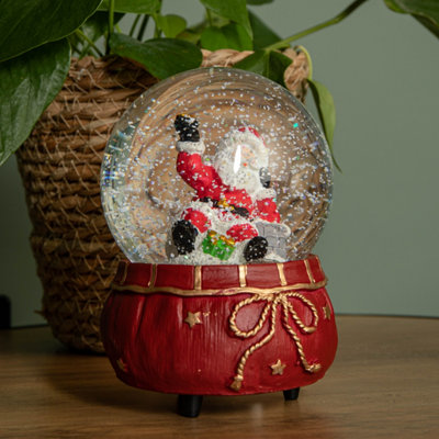 10cm Red Wind up Musical Snow Sphere with Santa Scene | DIY at B&Q