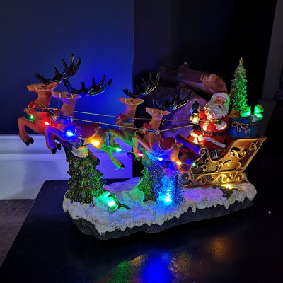 35cm Battery Operated LED Musical Santa Riding Sleigh with Turning Tree ...