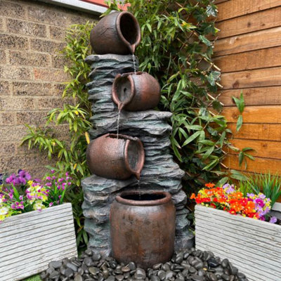 4 Pouring Jugs on Rock Solar Powered Water Feature With Cover