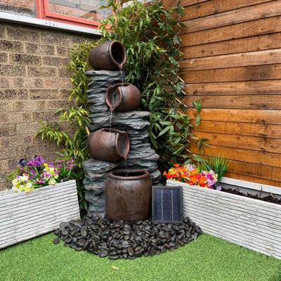 4 Pouring Jugs on Rock Traditional Solar Water Feature