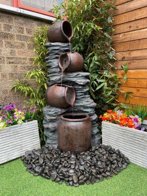 4 Pouring Jugs on Rock Traditional Solar Water Feature