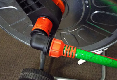 Angled hose connector ,ideal for use with hose carts to prevent kinking,twist and lock feature ...