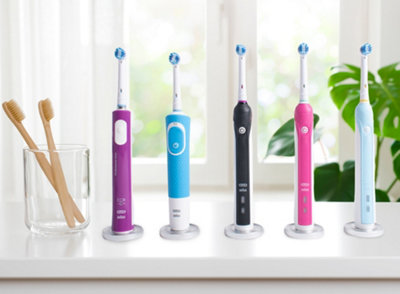 Electric toothbrush holder store