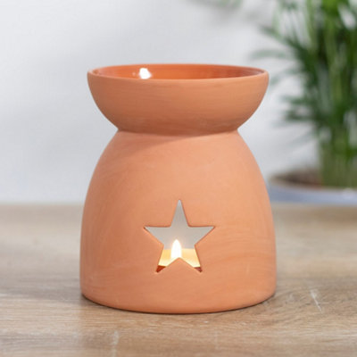 Ceramic Star Cut Out Oil Burner - Terracotta | DIY at B&Q