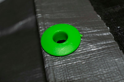 clip on replacement eyelets for tarpaulins and other sheeting in green