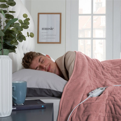 Heated over blanket store