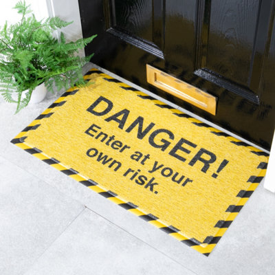 Danger Enter At Your Own Risk Doormat (70 x 40cm) | DIY at B&Q
