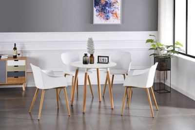 Eden Round Dining Set with a White Dining Table and 4 White Dining Chairs