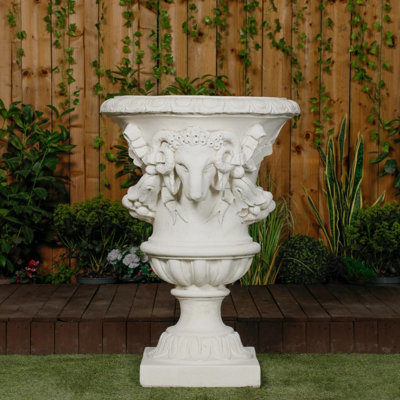 Elegant White Stone Cast Urn with Classical Swag Detailing