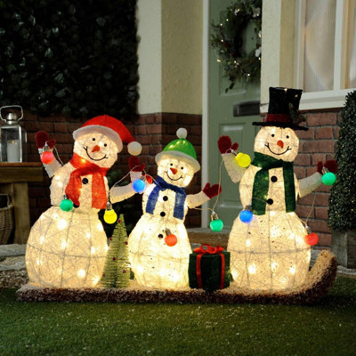 Festive 130cm Lit Snowman Family On Sledge 110 Warm White LEDs | DIY at B&Q