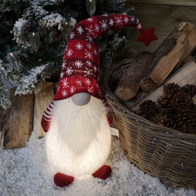 Festive Christmas 66cm LED Lit Snowflake Sitting Gonk - Red | DIY at B&Q