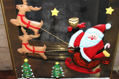 Free Standing Father Christmas and Reindeer Metal Fire Guard