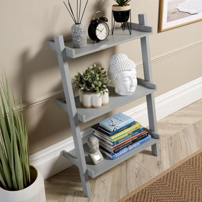 Grey ladder shelf store