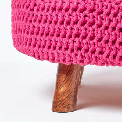 HOMESCAPES HOT PINK LARGE ROUND COTTON KNITTED FOOTSTOOL ON LEGS