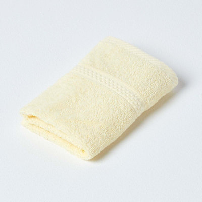 Homescapes Turkish Cotton Face Cloth, Yellow | DIY at B&Q