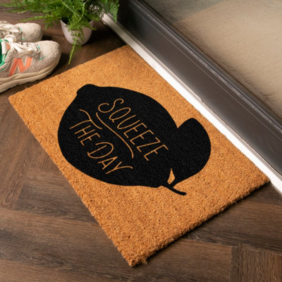 Humorous Squeeze The Day Doormat | DIY at B&Q