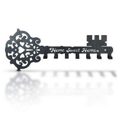 Key shaped key holder for wall store