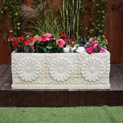 Large Daisy design Stone Planter Trough | DIY at B&Q