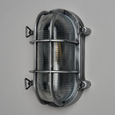 Litecraft Remy Silver Outdoor Caged Oval Bulkhead Wall Light