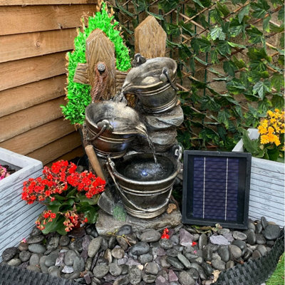 Metal Pouring Jugs Traditional Solar Water Feature | DIY at B&Q
