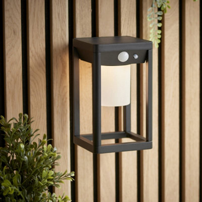 Modern Solar Powered Wall Light with PIR & Photocell - Textured Black ...