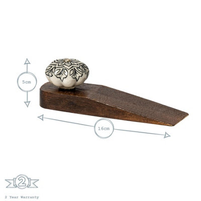 Nicola Spring - Wooden Door Stop - Black Flower | DIY at B&Q