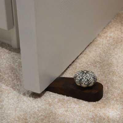Nicola Spring Wooden Door Stop - Black Flower