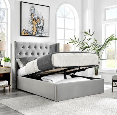 Olivia Grey Velvet King Size 5FT Fabric Wingback Ottoman Storage Gas Lift Bed Frame With Rusted