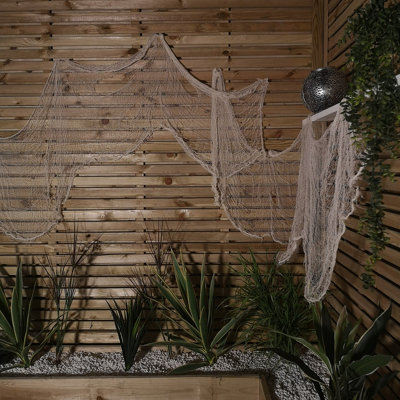 Pack of 2 2.9m Halloween Freaky Fabric Net Decoration in Cream | DIY at B&Q