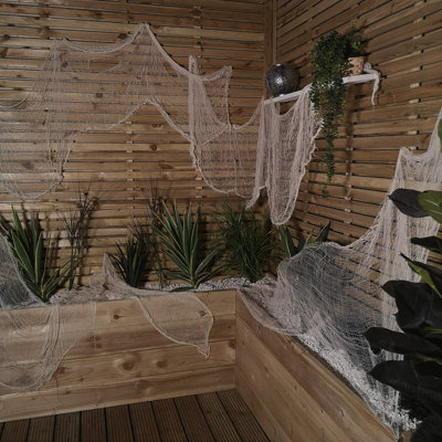 Pack of 6 2.9m Halloween Freaky Fabric Net Decoration in Cream | DIY at B&Q