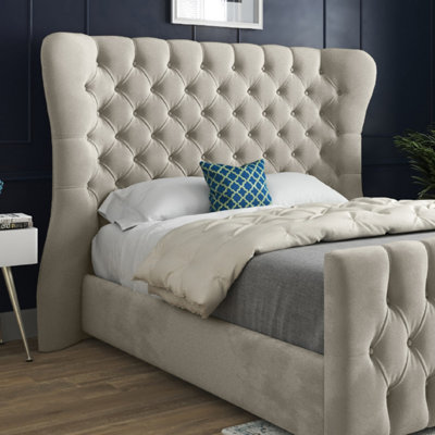 Parma Wide Curved Winged Upholstered Soft Velvet Cream Bed Frame