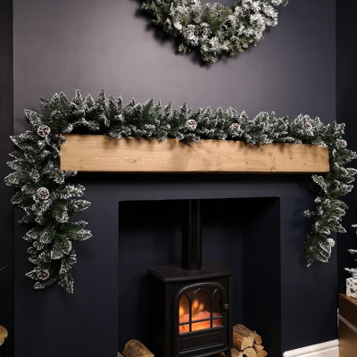 Premier Christmas Rocky Mountain Garland 2.7m Snow Flocked with Cones ...