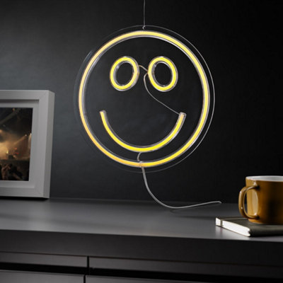 RED5 Neon Effect Smiley Yellow Face Wall Light | DIY at B&Q