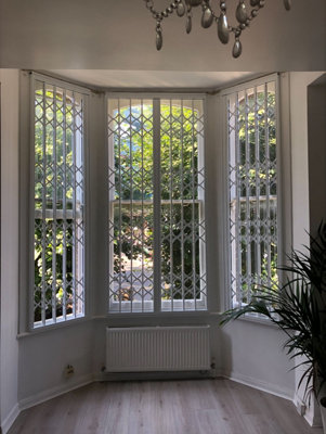 Security Direct High Security Retractable Door Grille S Lattice Design ...