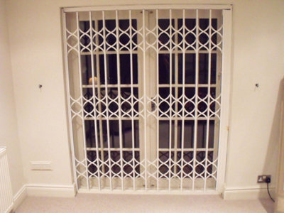 Security Direct High Security Retractable Door Grille S Lattice Design ...