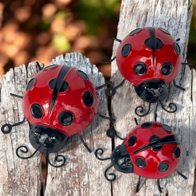 Set of 3 metal Ladybird wall art home or garden decorations