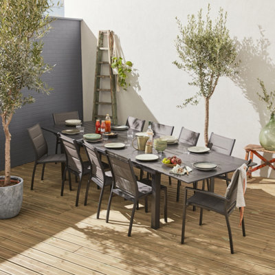 sweeek. 10 seater extendable aluminium garden table set with chairs Odenton Anthracite 335x110x74 cm