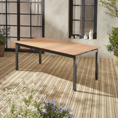 sweeek. 8 to 10-seater extendable wooden and alumimium garden table ...