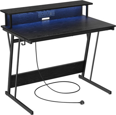 VASAGLE Gaming Desk with LED Lights and Built In Power Outlets Computer Desk with Monitor Shelf