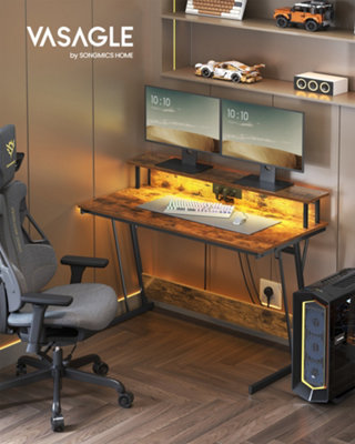 VASAGLE Gaming Desk with LED Lights and Built-In Power Outlets ...