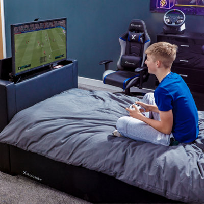 X Rocker Cerberus Ottoman TV Bed Double 4.6ft with Storage 32 Electric Lift PU Leather